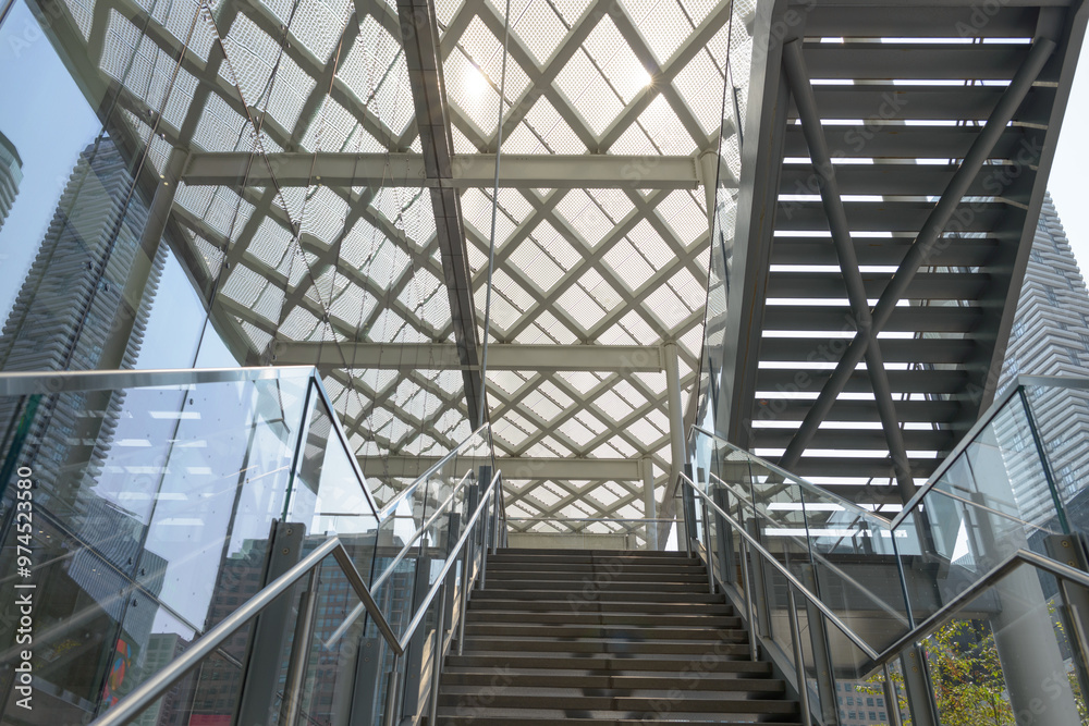 staircase leading to CIBC Square Elevated Park, featuring canopy over ...