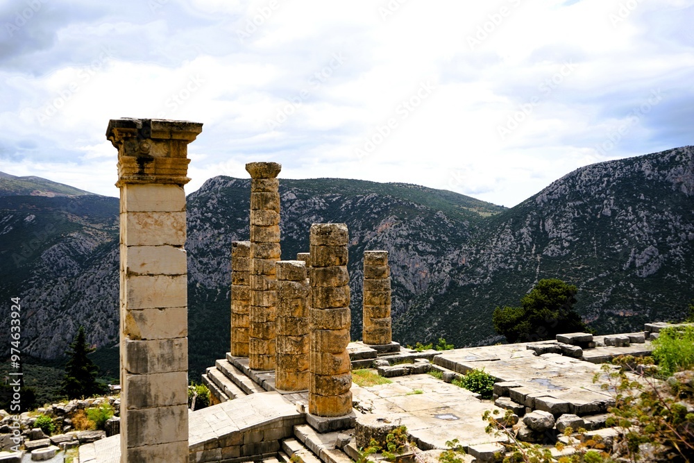 Ruins of the ancient Temple of Apollo in Delphi with its mighty round ...