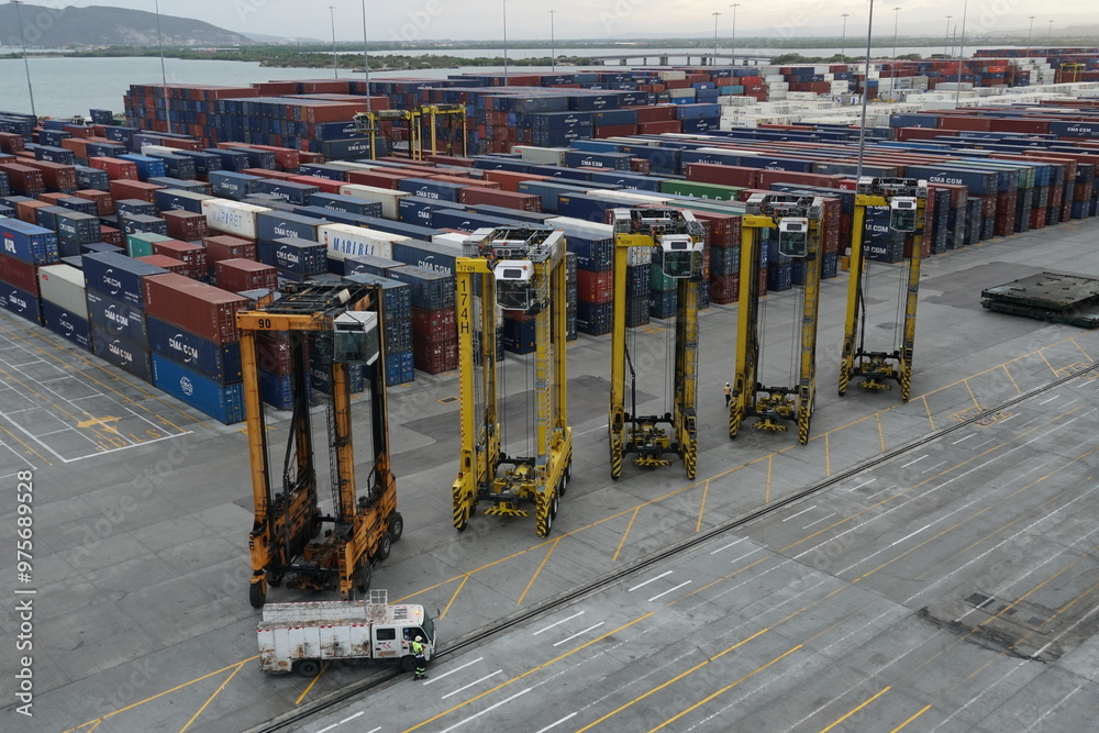 Kingston, Jamaica - 05 29 2024: Straddle carriers are arrayed at the ...