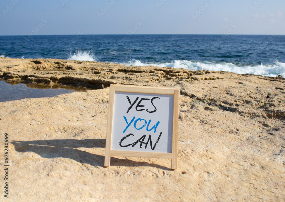 Yes You Can symbol. Concept words Yes You Can on white chalk blackboard ...