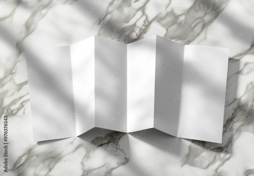 An open gate fold brochure, with a three panel design and six pages ...