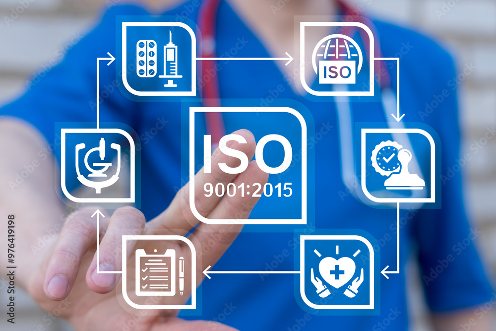 Doctor using virtual touch screen presses inscription: ISO 9001:2015 ...