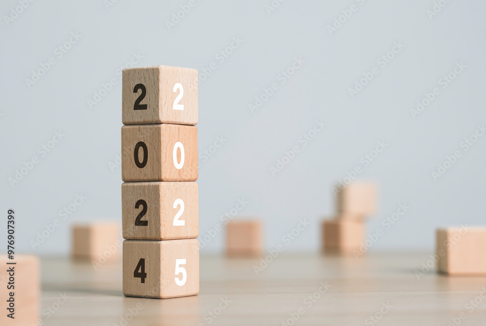 2025 with wooden blocks symbolizing target business for the upcoming ...