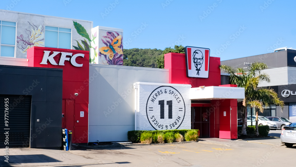 Street view of KFC Kentucky Fried Chicken fast food restaurant with sign and logo in capital ...