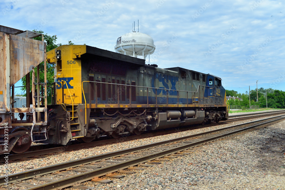 An-off road CSX Transportation locomotive functions as a rear-train ...