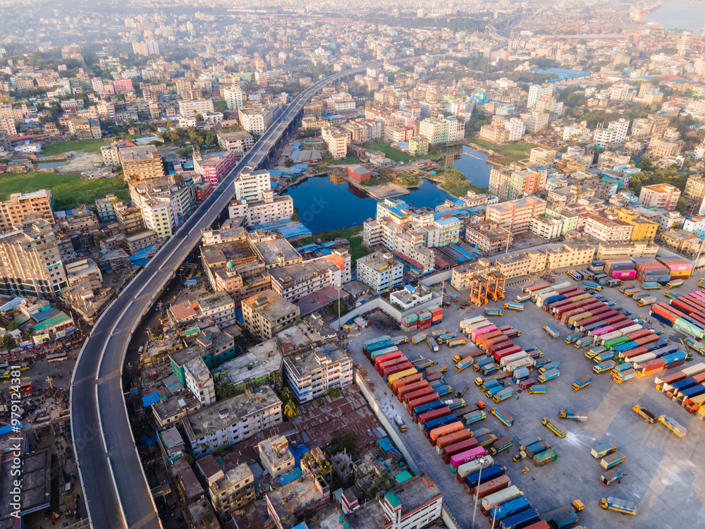 Aerial view of bustling Chattogram Port and elevated expressway with ...