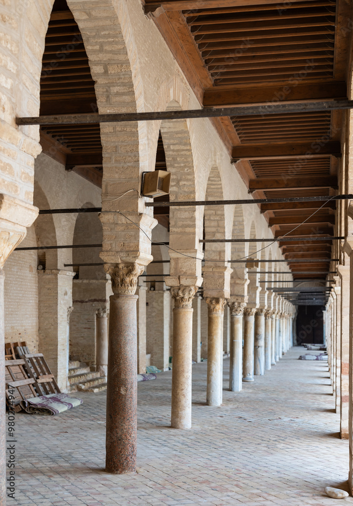 Poster Long narrow passages under arches of temple, courtyard of great ...