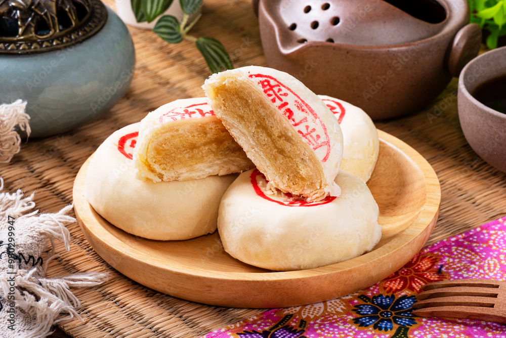 Mung bean cake on the plate,the Chinese words on the moon cake is 'mung ...