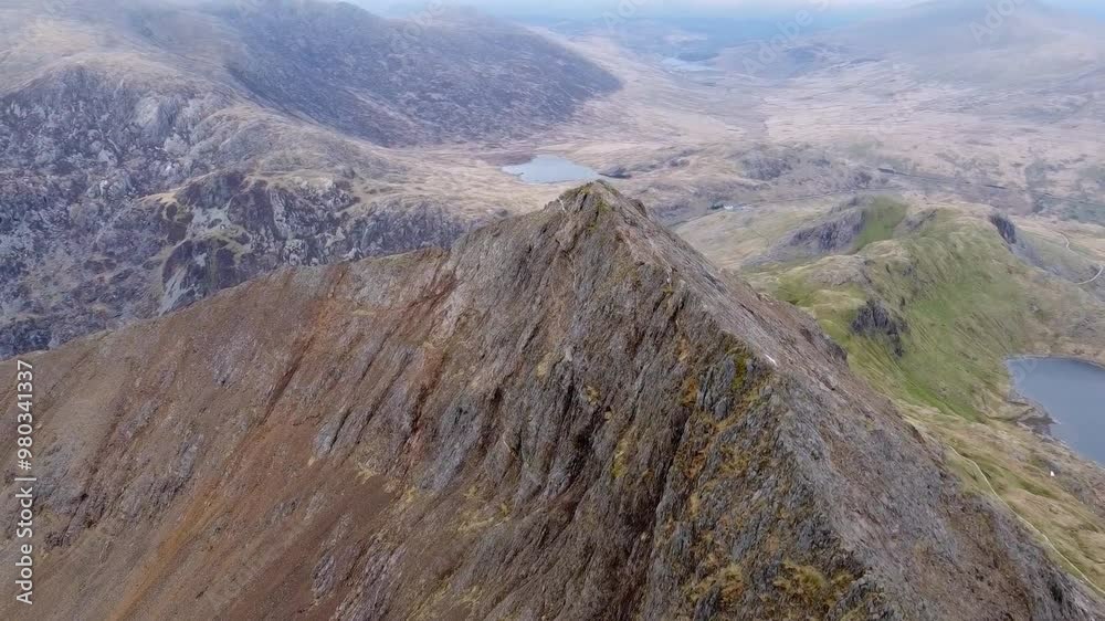 Drone captures the majestic sharp Crib Goch Mountain from aerial ...