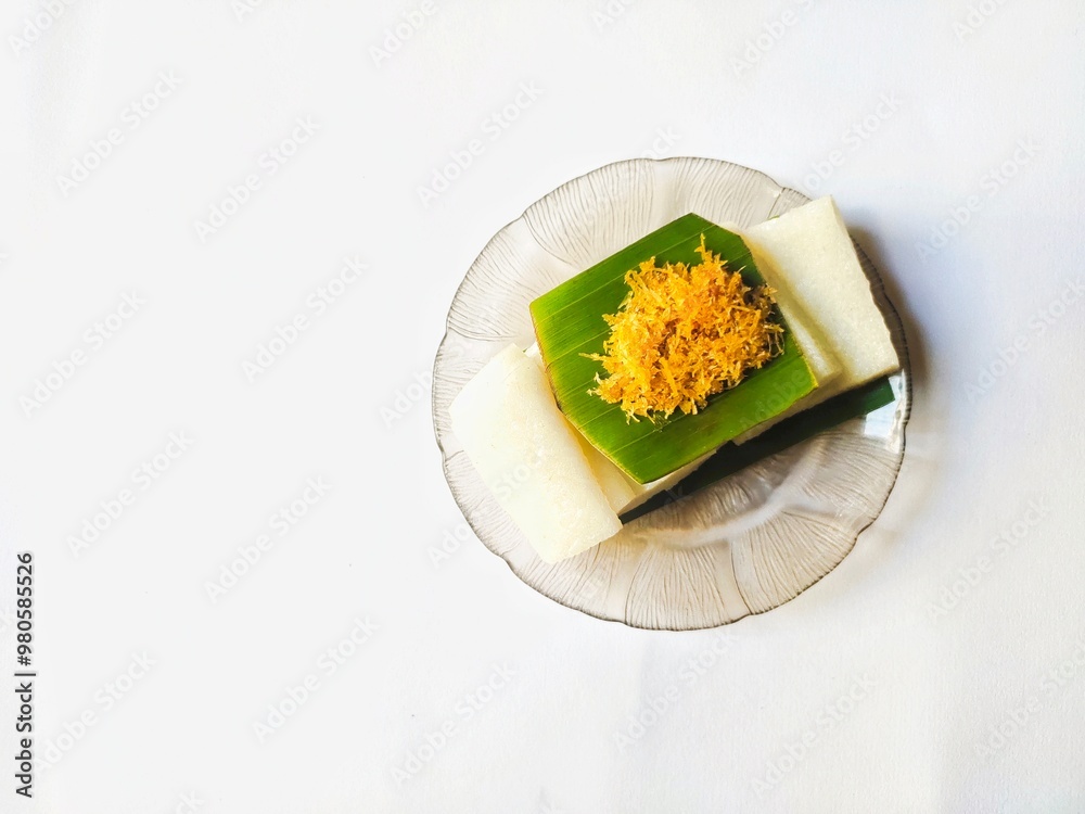 Jadah, a traditional Javanese cake, is made by steaming until cooked ...