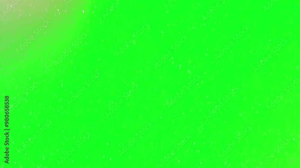 Falling and movement of golden, silver and colored particles suspended ...