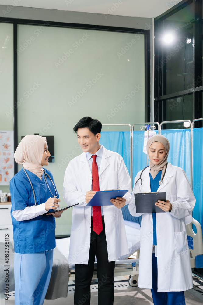 Doctors and nurses working together in a hospital ward, showcasing ...