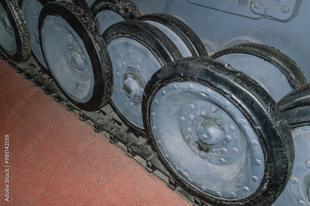 Rollers paired on each torsion bar suspension of a German tank. The ...
