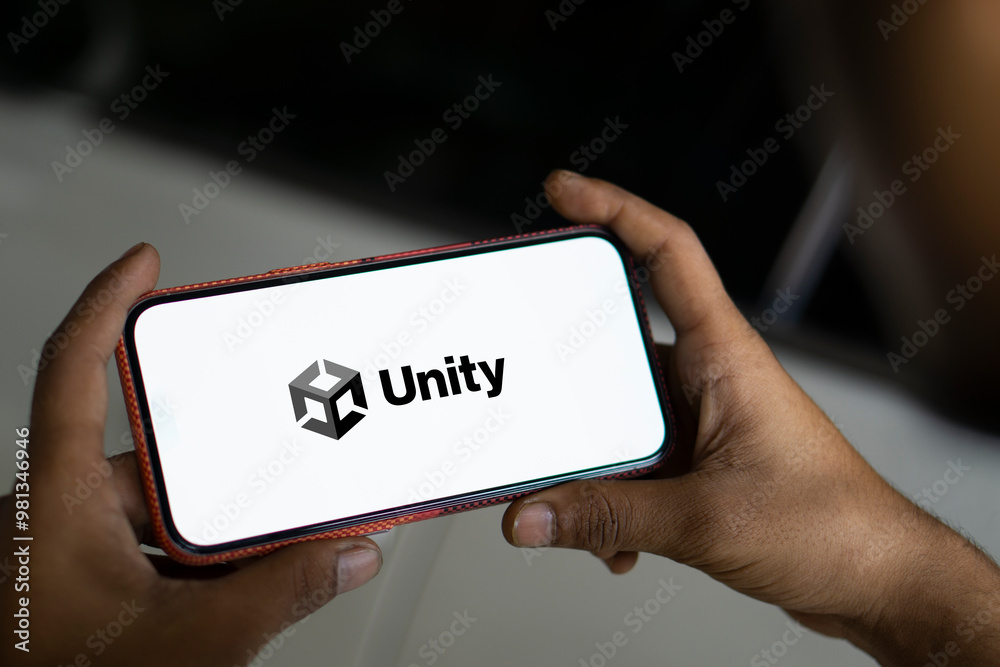 Dhaka, Bangladesh- 18 Sep 2024: Unity logo is displayed on smartphone. Unity is a cross-platform ...