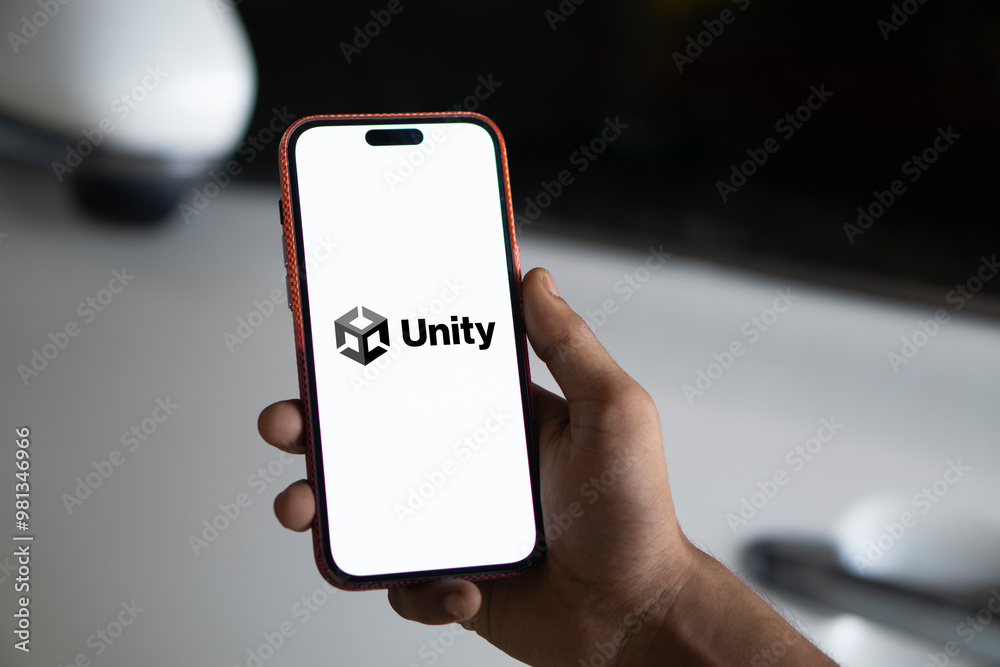 Dhaka, Bangladesh- 18 Sep 2024: Unity logo is displayed on smartphone. Unity is a cross-platform ...