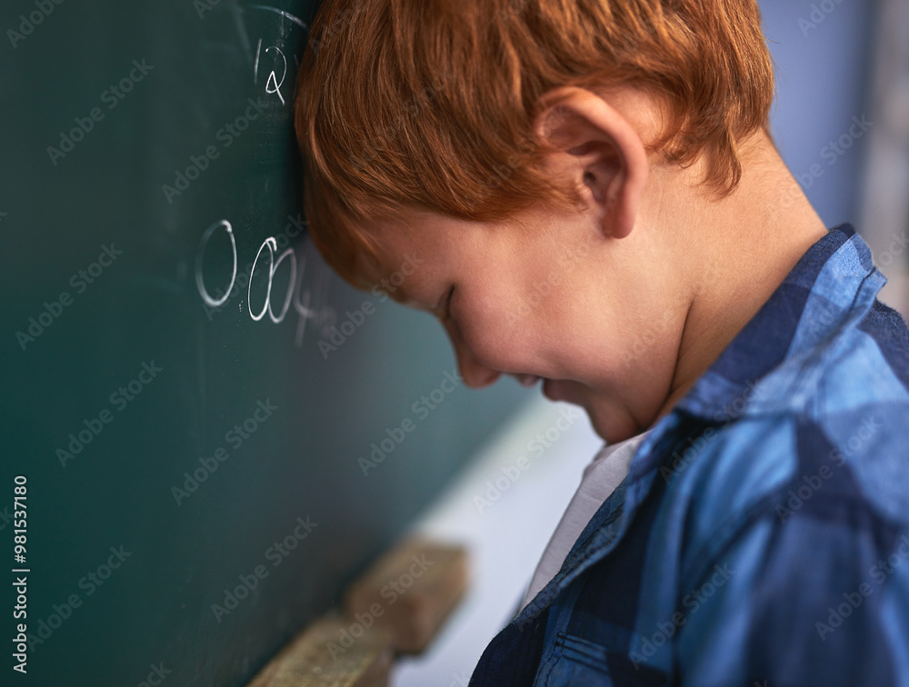 Kid, blackboard and boy in classroom, frustrated and stress with ...
