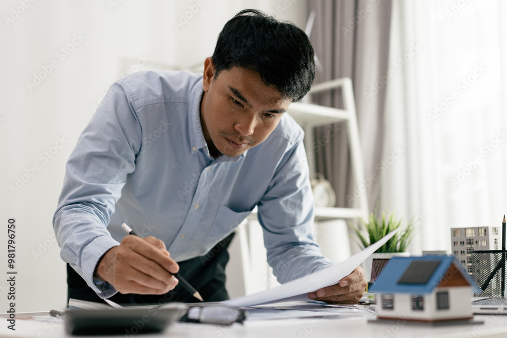 Architect working drawing draft on blueprints in the office, working ...