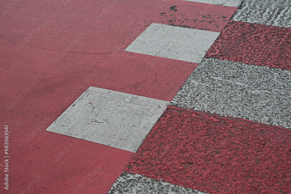 Close-up of a sidewalk and road markings, bike path, blind lane ...