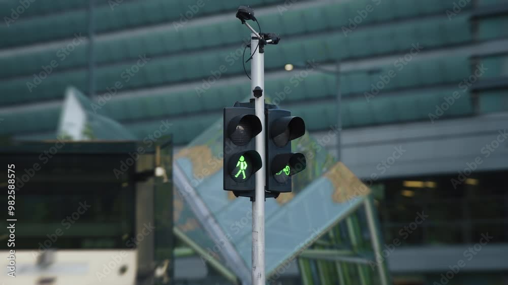 Close-up view of pedestrian traffic light changing from red to green ...