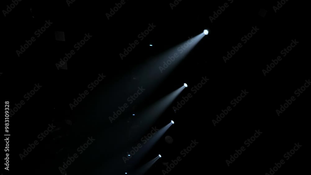 Stage lights in the studio. Stage lighting with a little smoke. Rays of ...