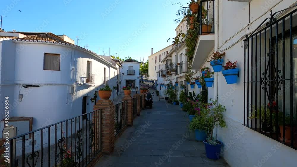 Charming white Spanish hill village overlooking the Costa del Sol ...