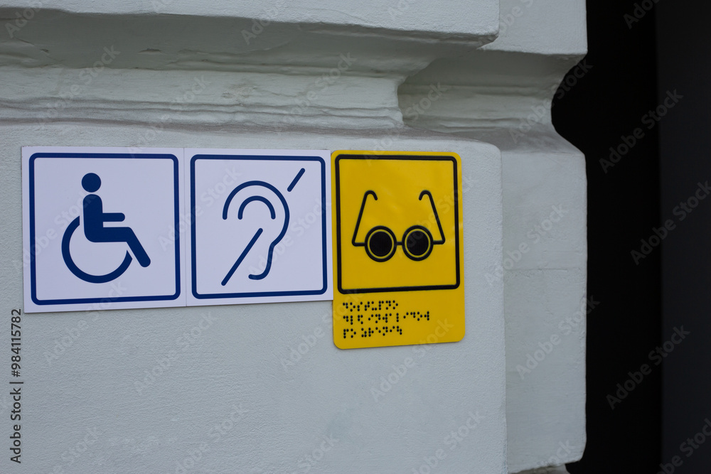 Signs indicating access for people with disabilities. Symbol of deaf ...