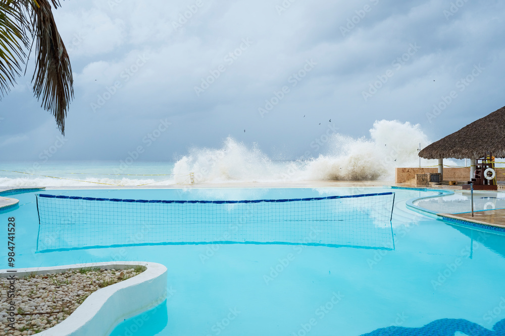 Wonderful heavy sea, big waves crashing into the pool,background rain ...