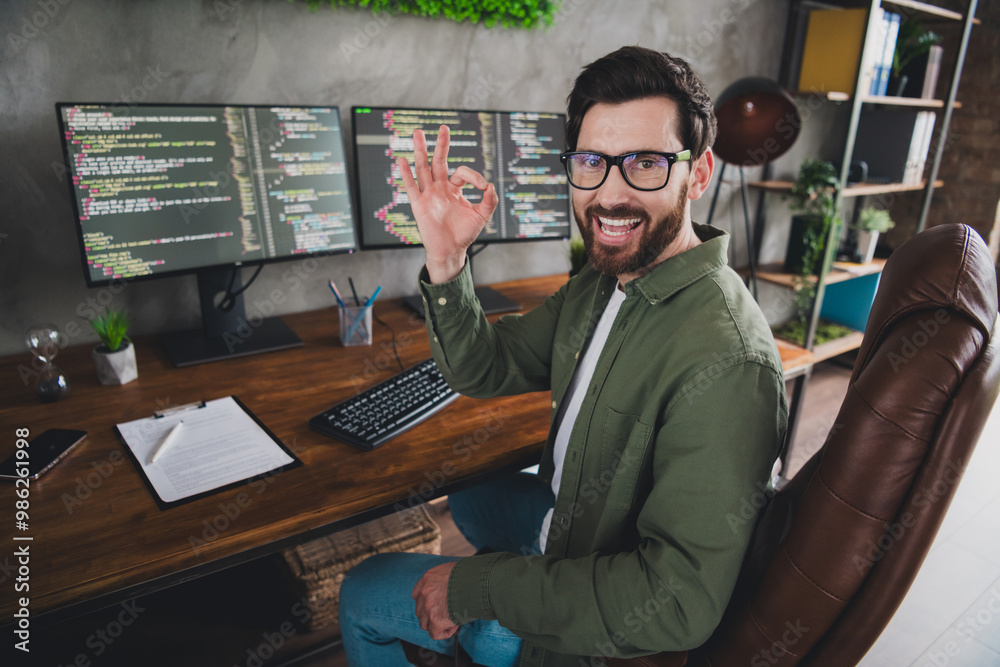 Portrait of professional hacker young man show okey symbol computer ...
