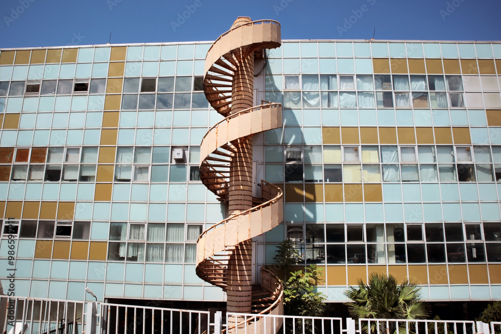 Emergency exit stairs of a multi-storey building.Front view of spiral ...