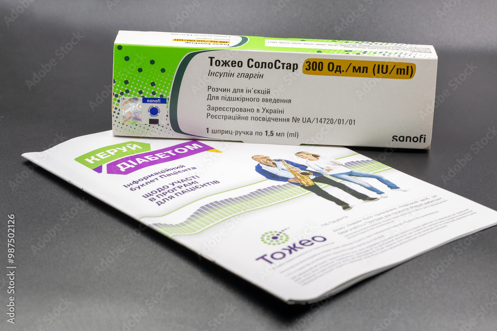 Sanofi Toujeo SoloStar insulin pen injection package closeup on black ...