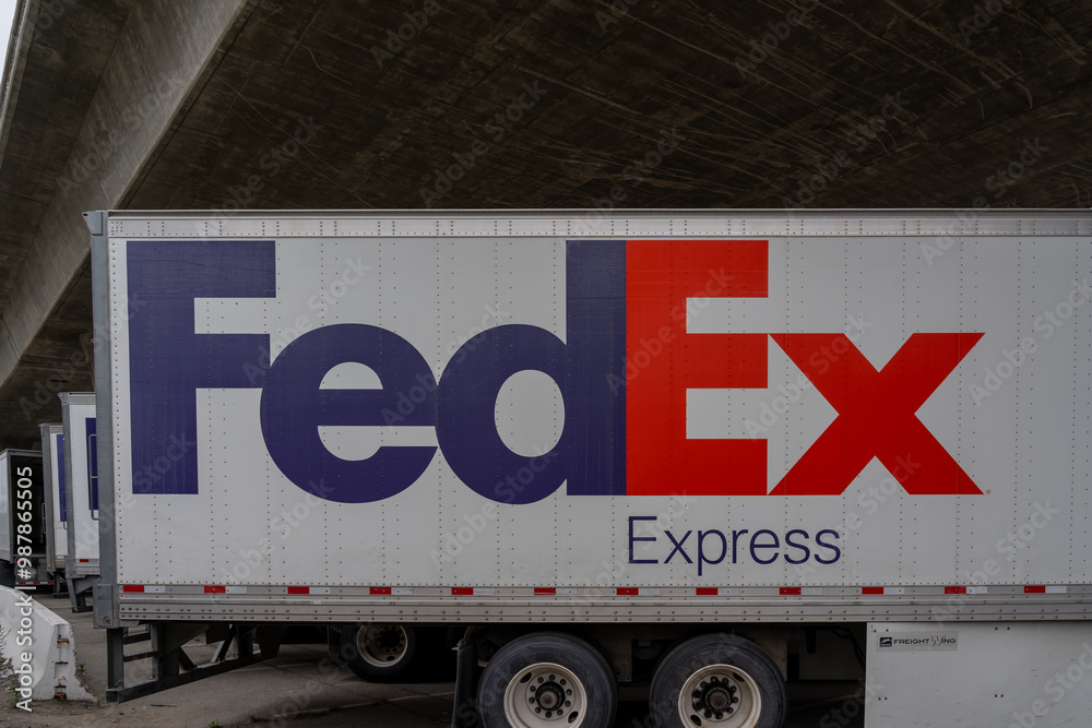 Los Angeles, California, USA - May 28, 2023: FedEx Express logo sign on ...