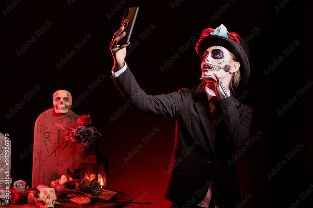 Woman taking selfie pictures with phone during Day of the Dead Mexican ...