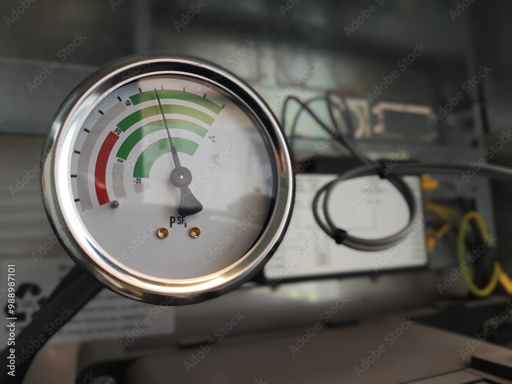 The image shows a close-up of a pressure gauge marked with PSI and ...