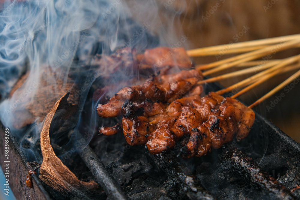 Sate or Chicken satay, rabbit meat, lamb satay grilled on burning ...
