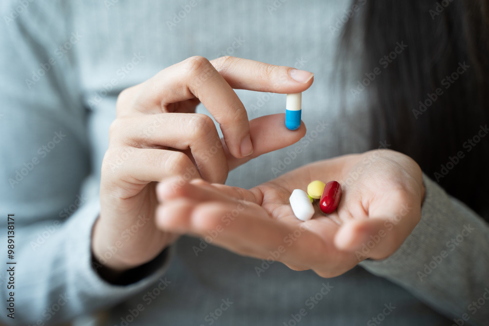 Healthcare Harmony: Close-Up Hands Holding Medication and Water Glass ...