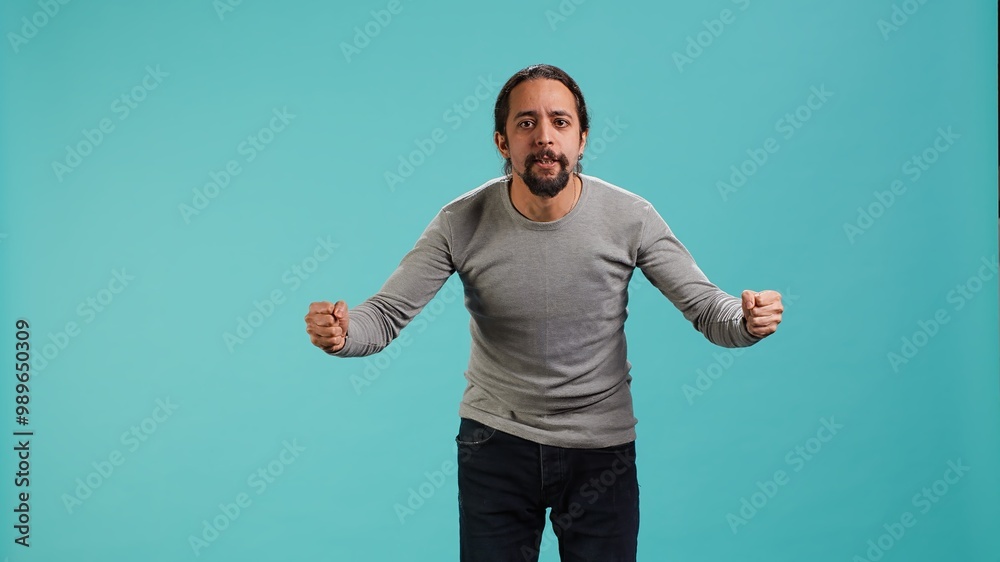 Portrait of irate man feeling outraged, yelling at friend, releasing ...
