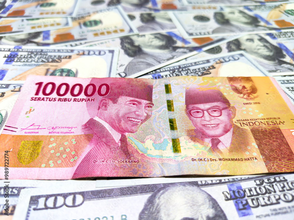 focus on money. a stack of 100 US dollar banknotes and one 100 ...