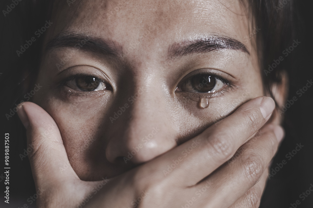 Crying woman. The concept of stopping violence against women and the ...