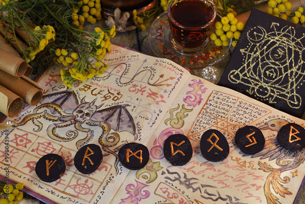 Mystic still life with open book of spells, runes and witchy ritual ...