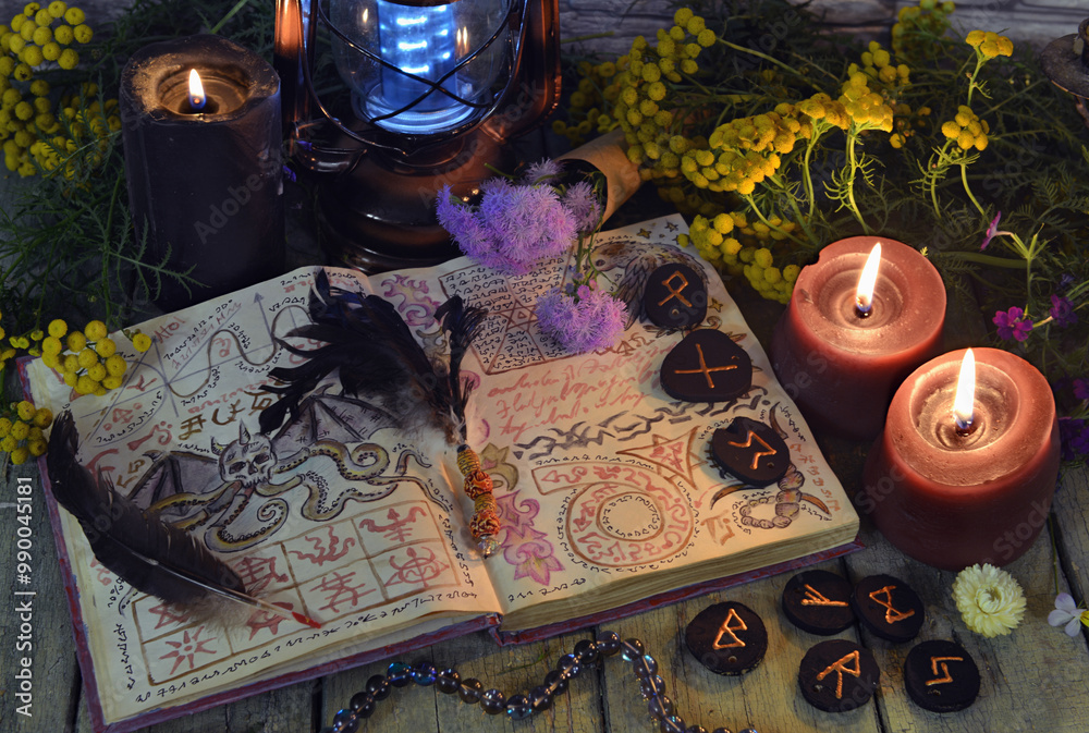 Mystic still life with book of spell, runes and witchy ritual objects ...