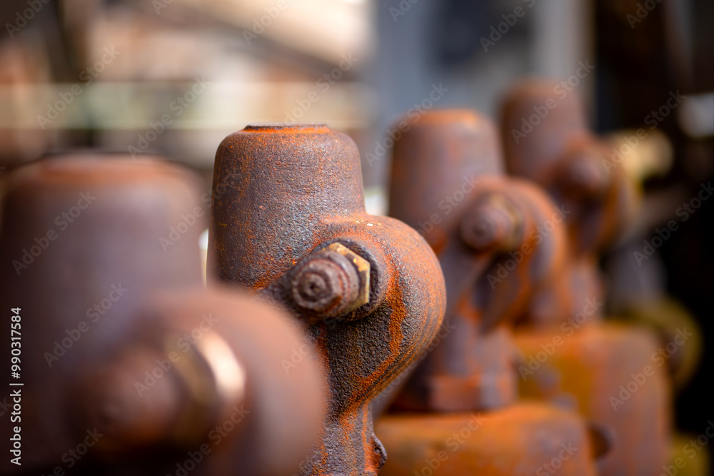 Rusty row of machine parts of a former blast furnace plant in Duisburg ...