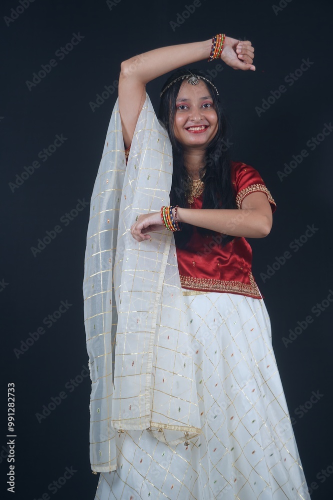 Graceful Garba Dance: Young Indian Girl in Traditional Attire ...