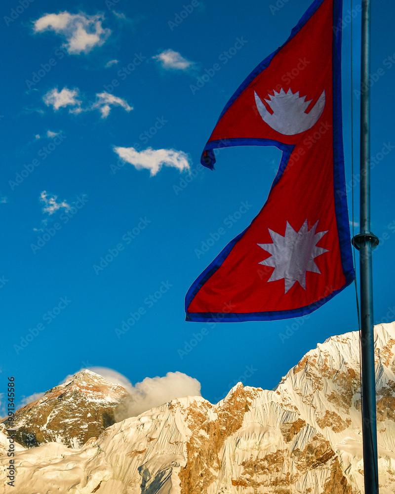 Waving nepalese flag. Mount Everest peak from Khumbu valley, Solukhumbu ...