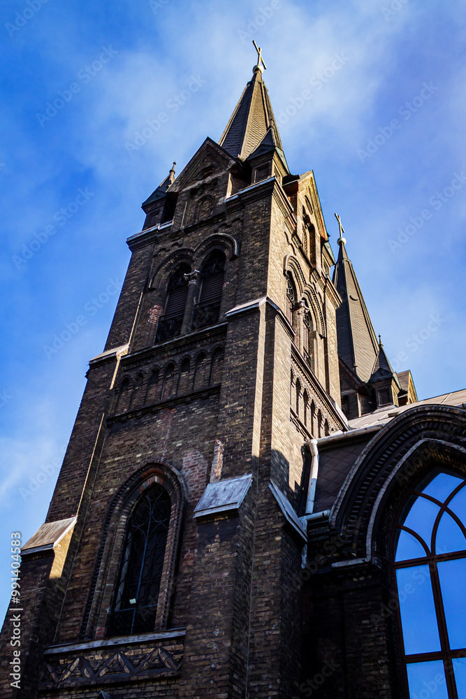 Building cityscape, tower roof with spires and cross, gothic church ...