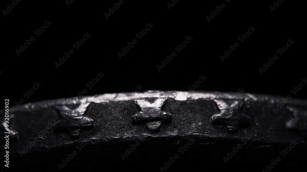 Coin edge, metallic silver star, metal in the darkness, Silver coin in ...