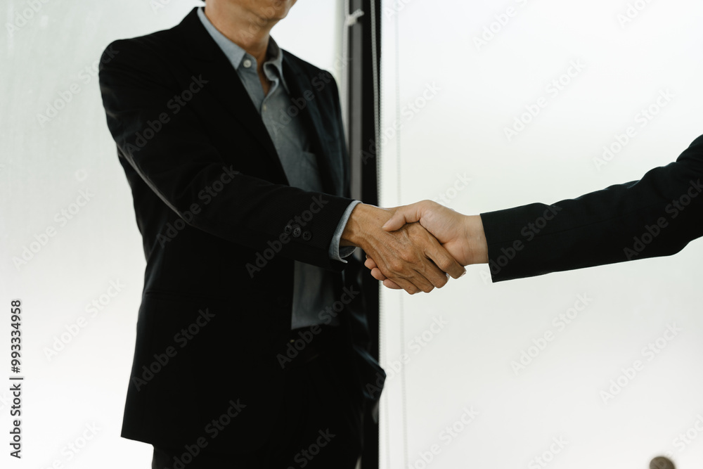The Deal Closed: A powerful handshake seals a business agreement ...