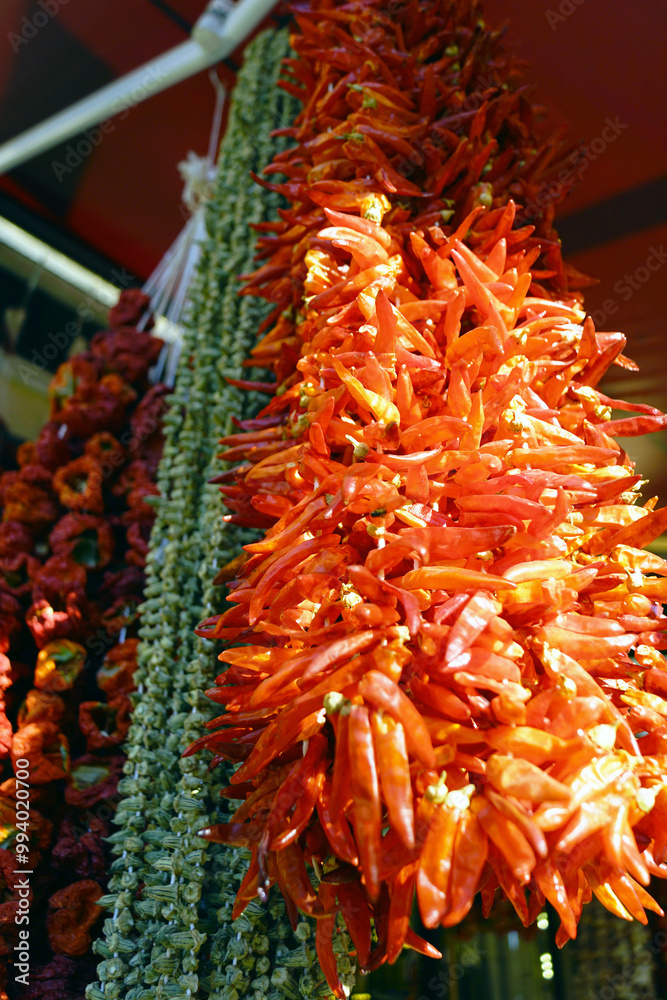 Food at a Turkish bazaar: chilli peppers, okra and red paprika, dried ...