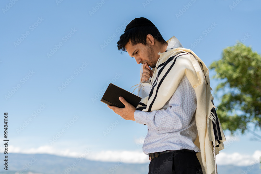 Young Man Jewish Wearing Tallit and Kippah Kisses the Tzitzit While ...