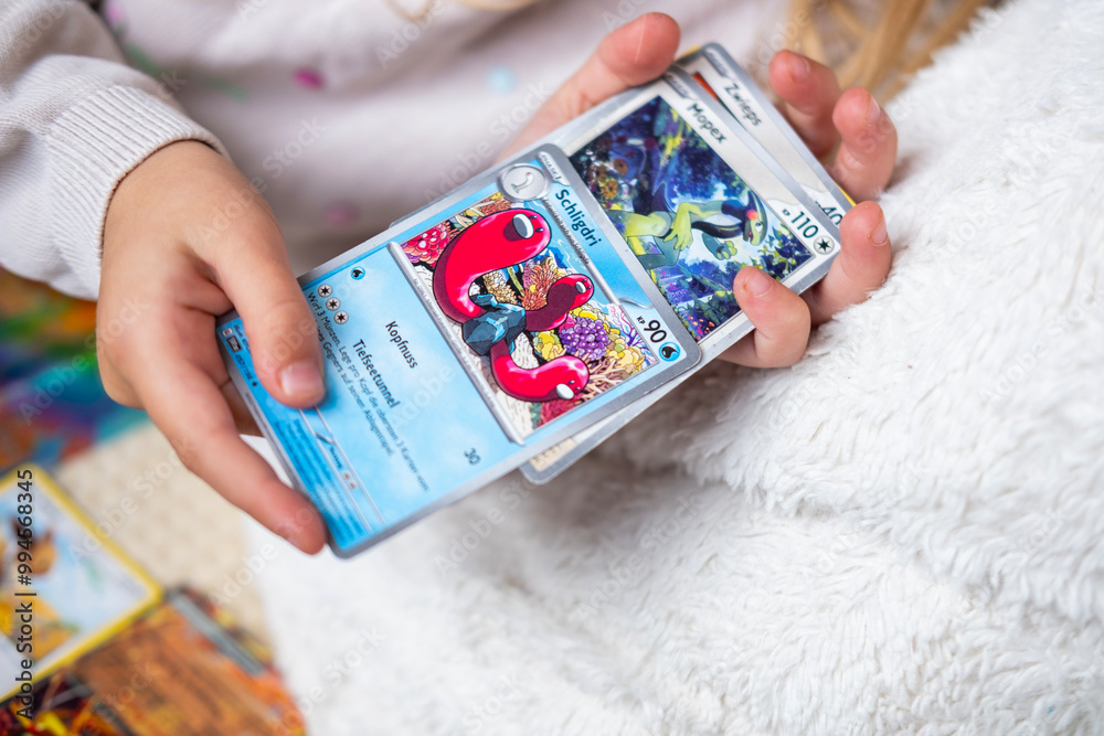 child collecting Pokemon Trading Card Game, Childhood nostalgia meets ...