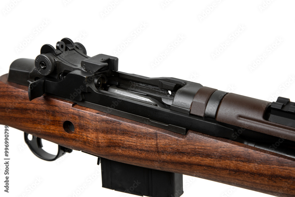 Classic semi-automatic rifle with a wooden stock and black metal parts ...